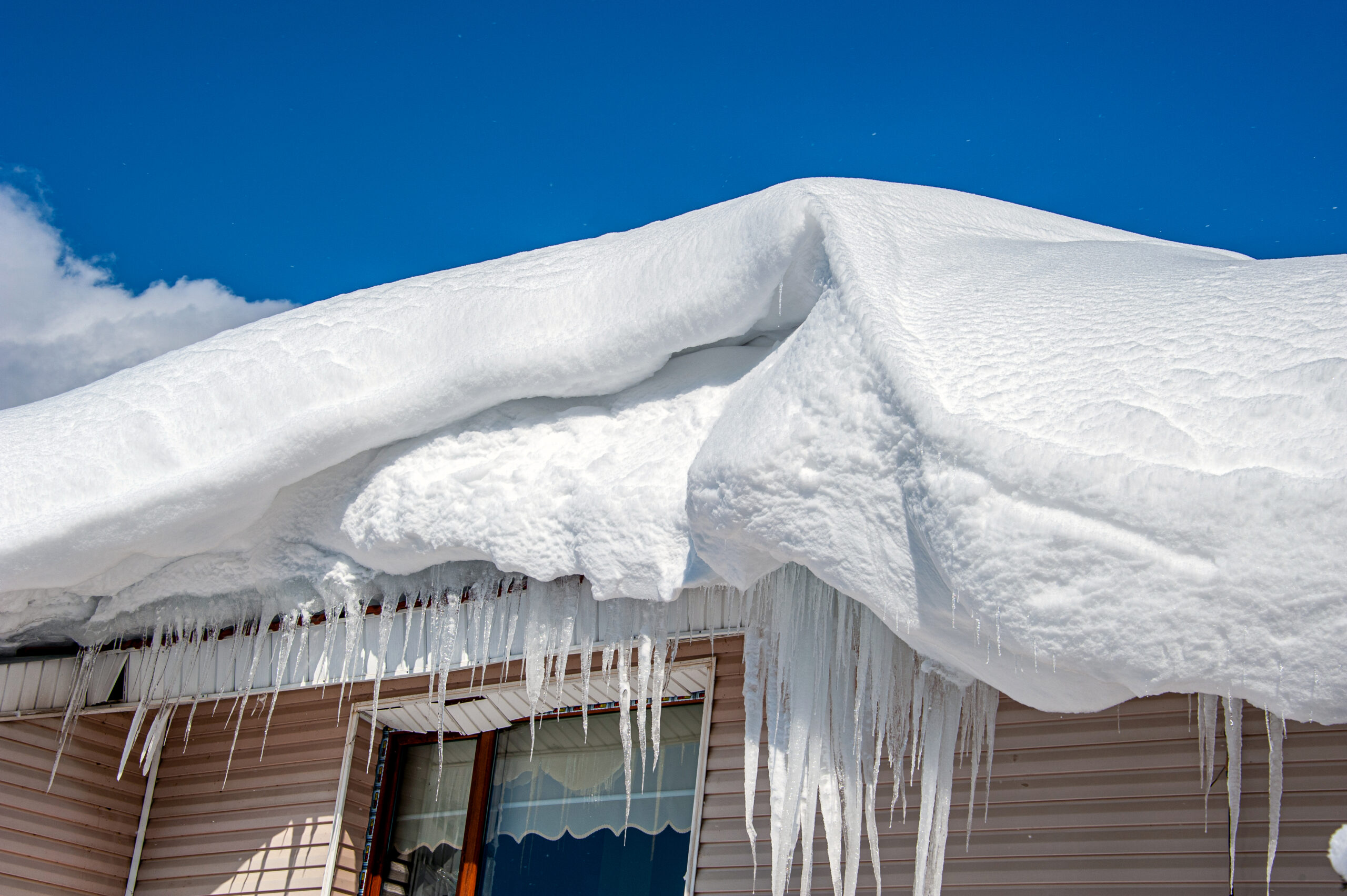 How Ice Dams and Snow Loads Threaten Minnesota Lake Homes in Winter ...